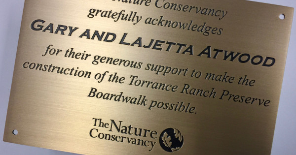 Etched stainless steel plaque